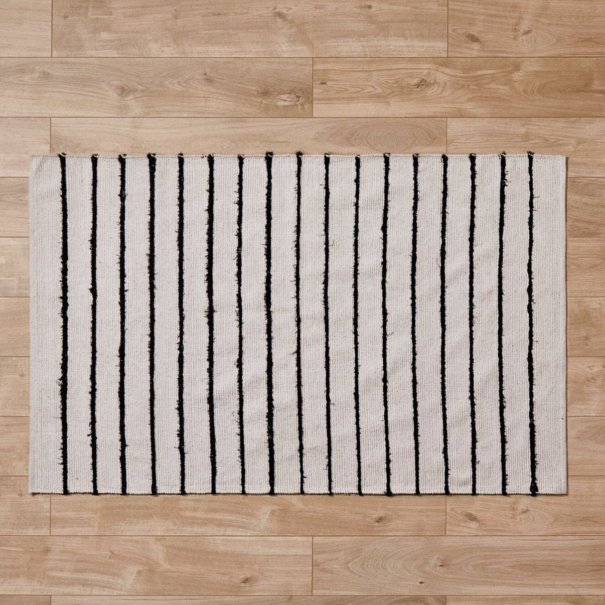 Evedon Striped Black Cotton Rug - 120x170cm - Laura James
