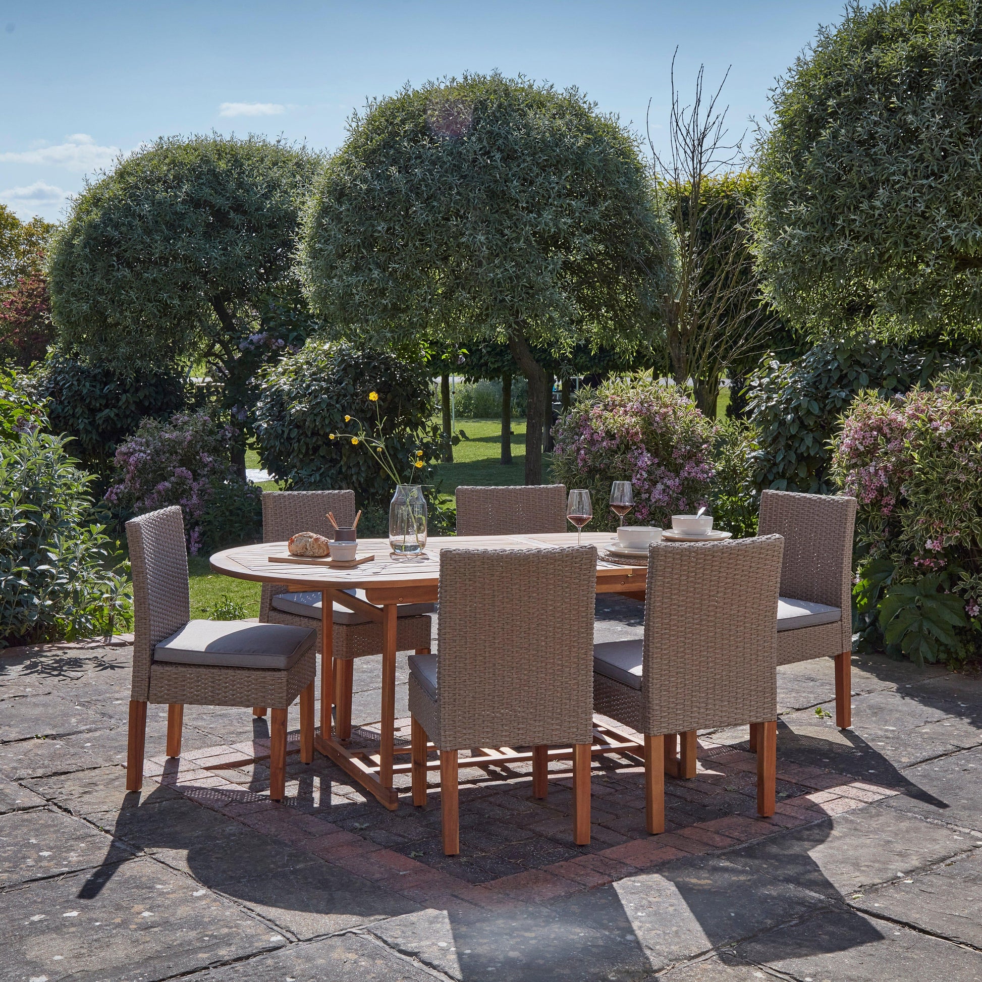 Oakley Extendable Wooden Dining Set & 6 Rattan Chairs - Laura James